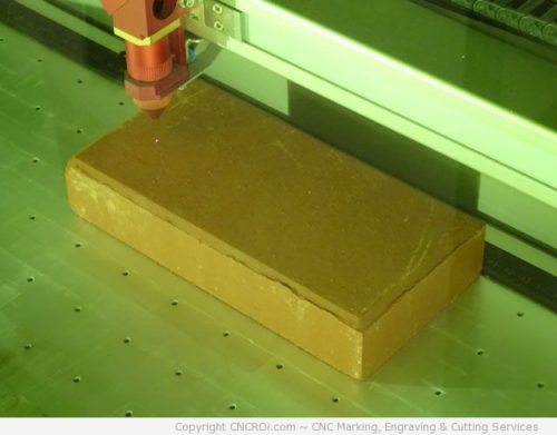 CNC Laser Engraving a Red Brick